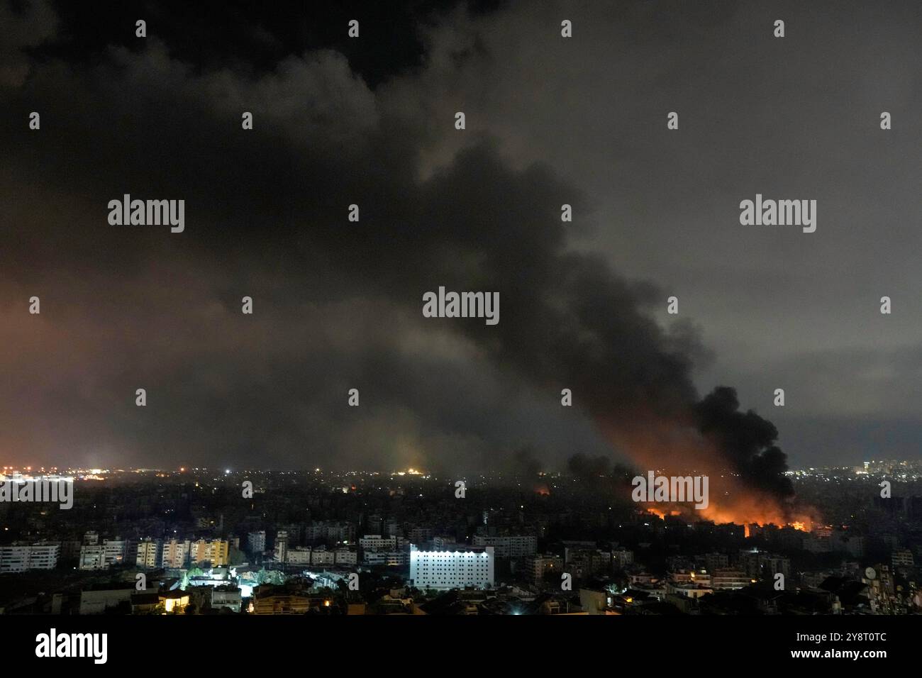 Flames and smoke rise from an Israeli airstrike in Dahiyeh, Beirut ...
