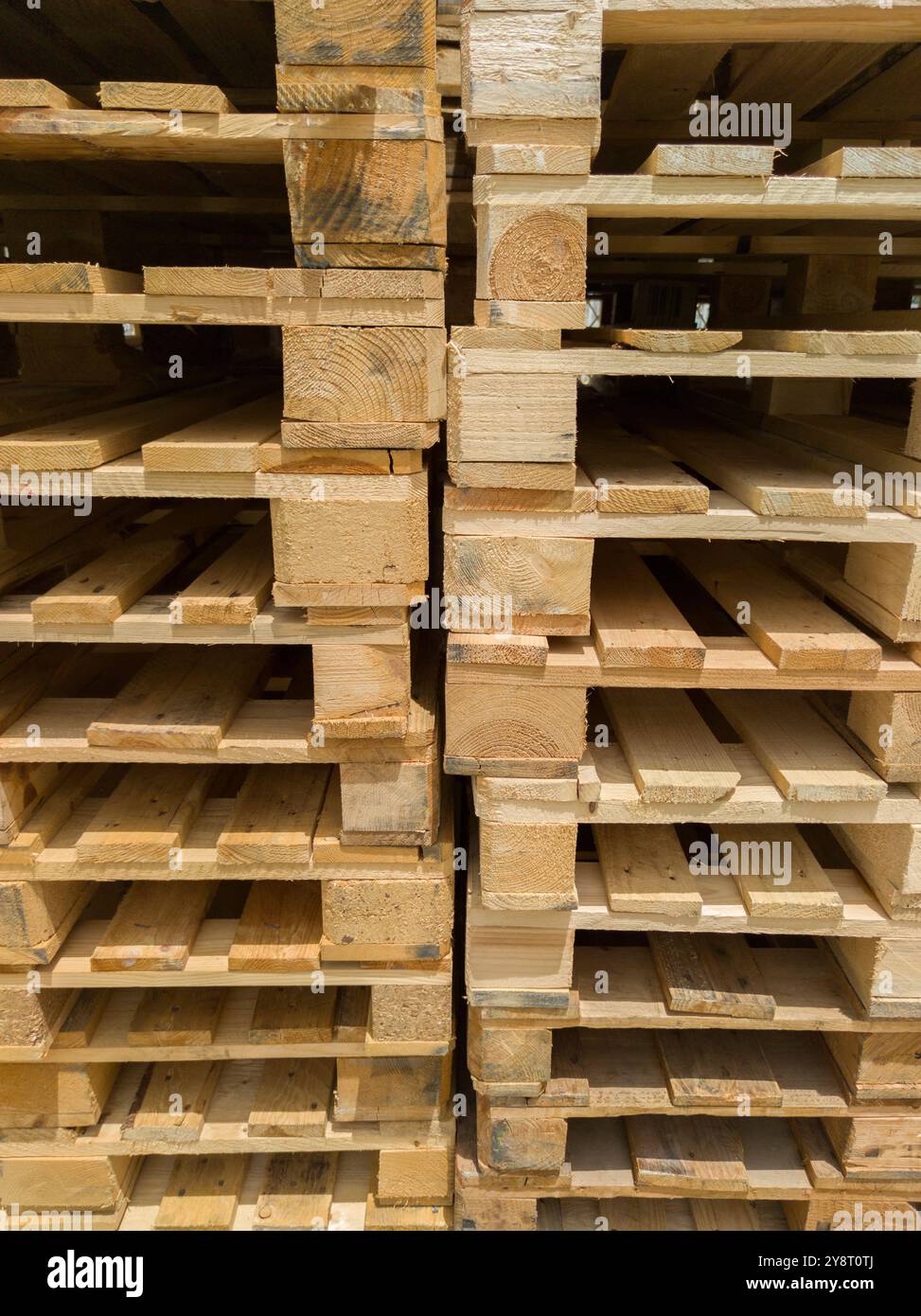 Stacked european stringer pallets. Wooden flat structure which supports ...