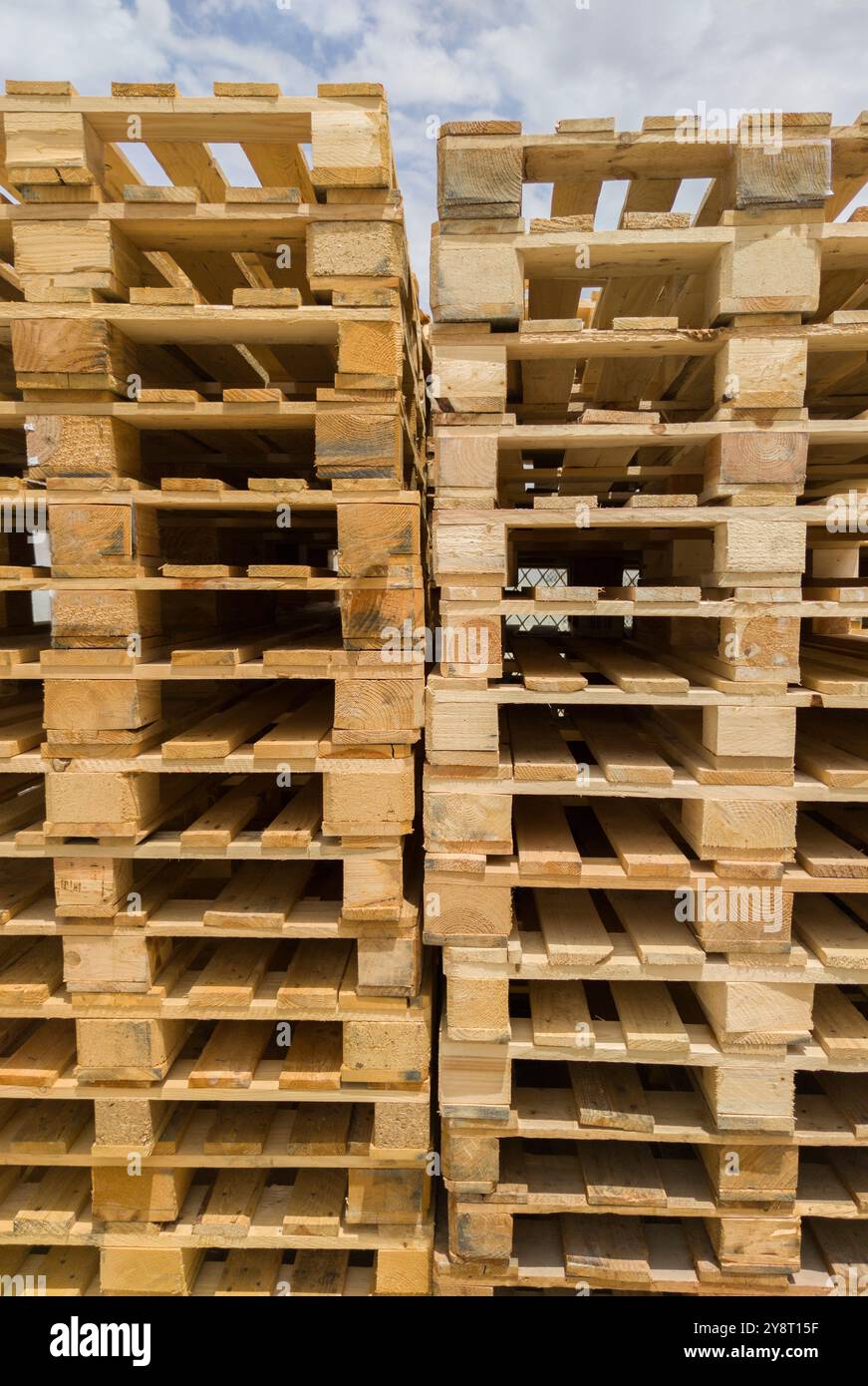 Stacked european stringer pallets. Wooden flat structure which supports ...