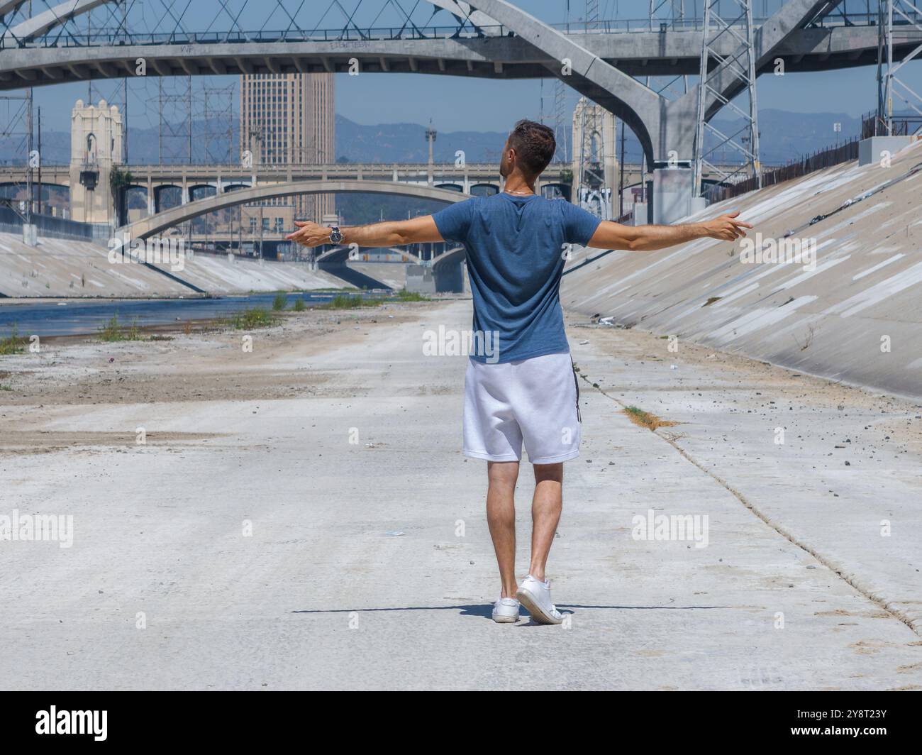 Person on Los Angeles River Banks with Iconic Arched Bridges Stock ...