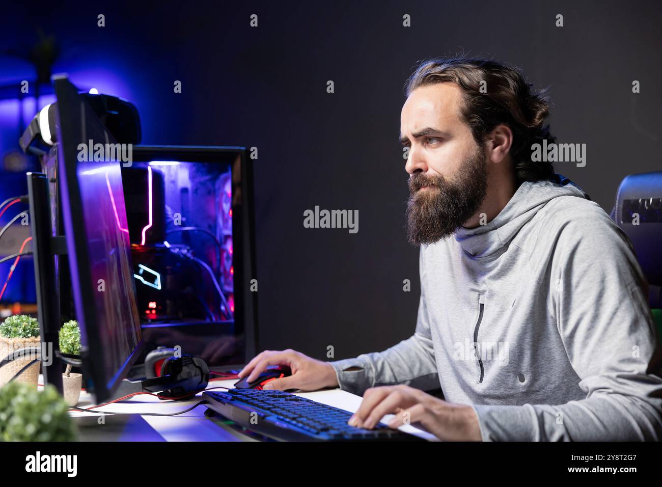Tired gamer in rgb hi-res stock photography and images - Alamy