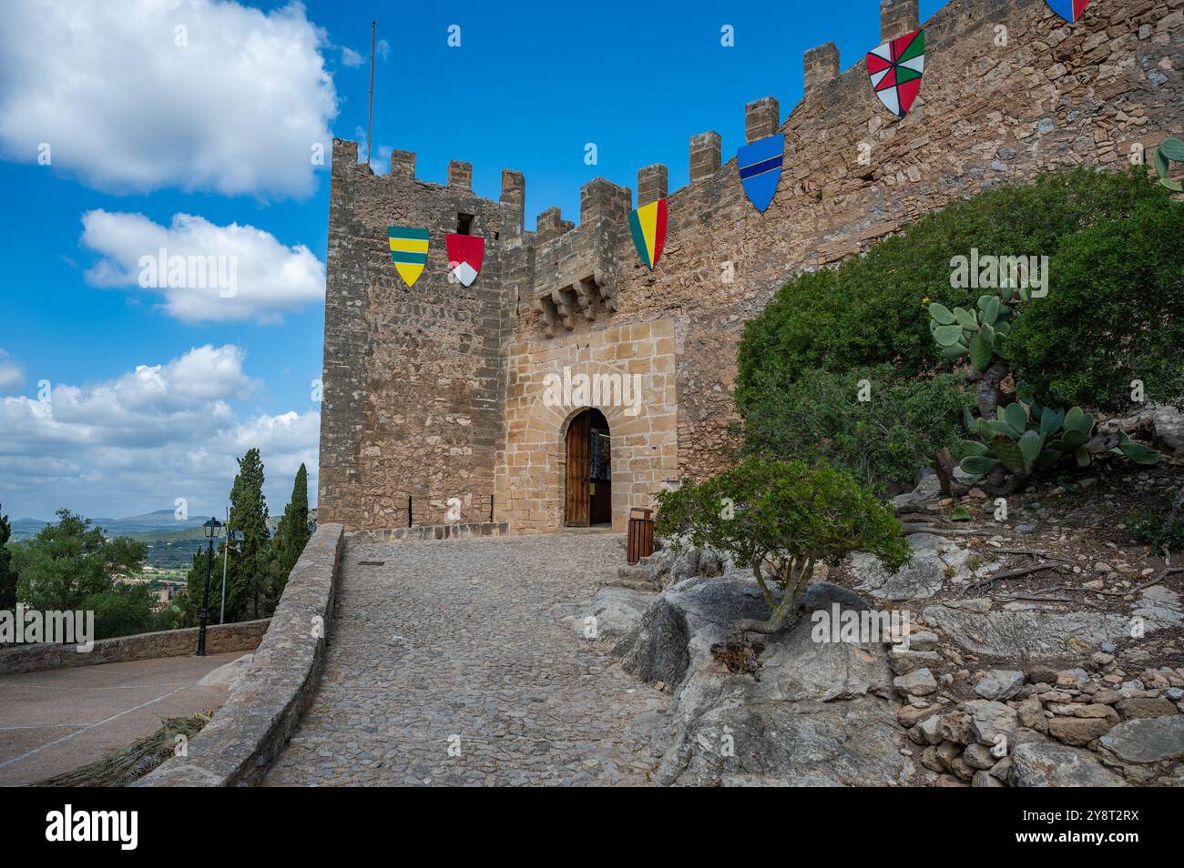 Entrance of Castell de Capdepera, Mallorca Castle wall with coat of ...