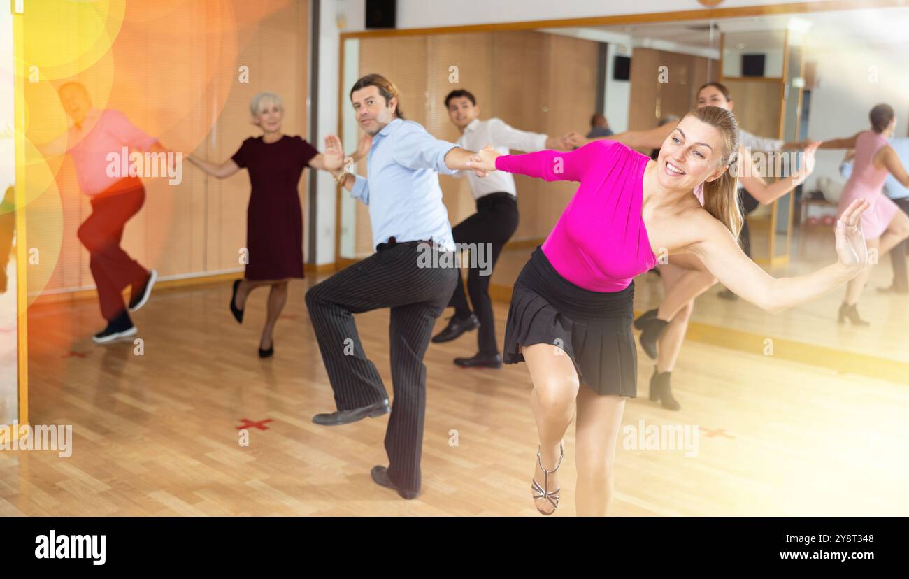 Couple of dancers rehearsing ballroom dances in dance studio Stock Photo - Alamy