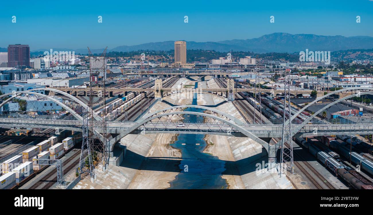 Aerial View of Los Angeles River and Arched Bridge with Cityscape Stock ...