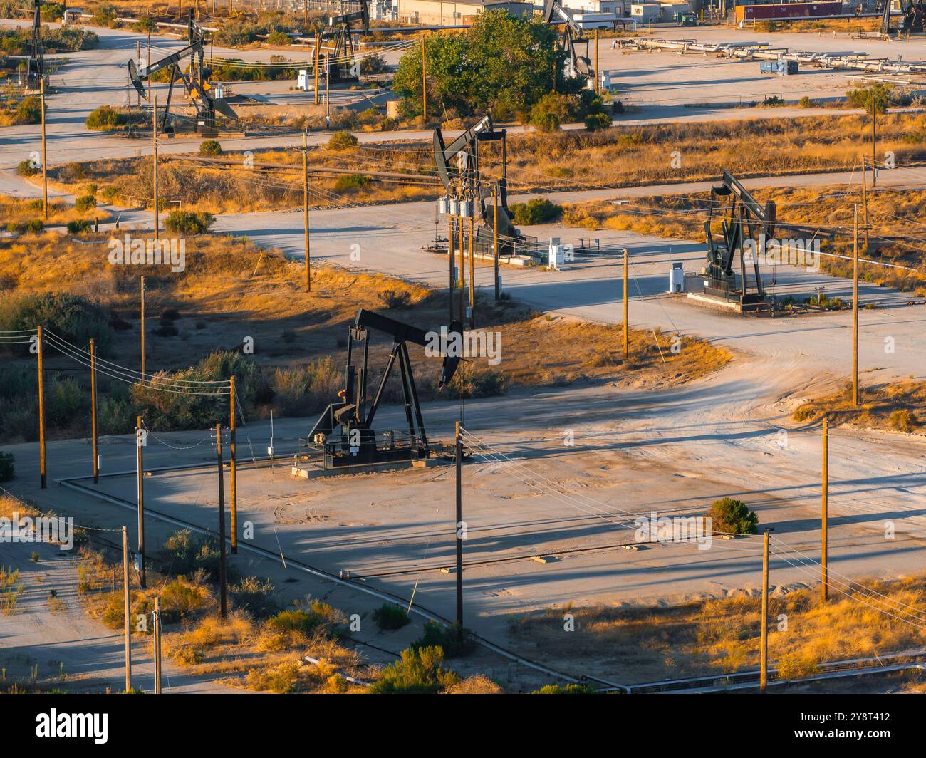 Aerial View of Oil Rigs in California Desert During Golden Hour Stock ...