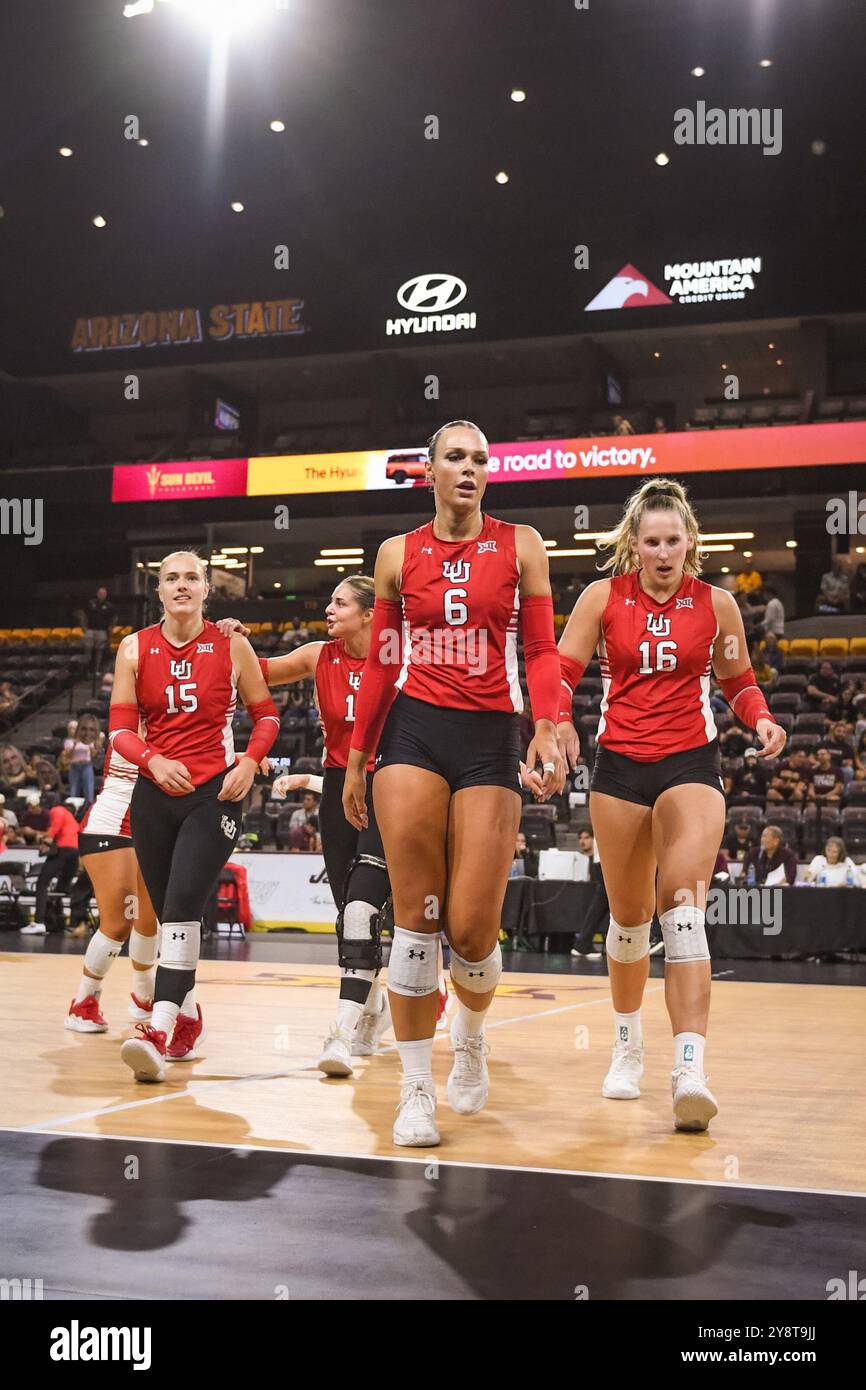 Utah outside hitter Ashley West (6) and the Utes walk around the net in ...