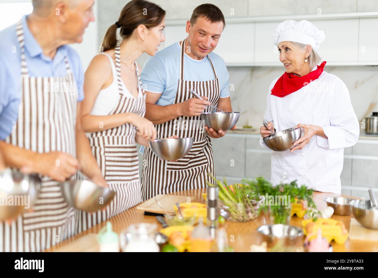 Female chef teaching senior hi-res stock photography and images - Alamy