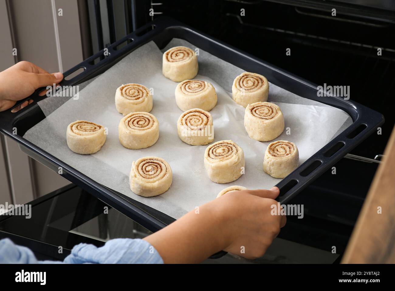 Woman putting traditional cinnamon hi-res stock photography and images ...