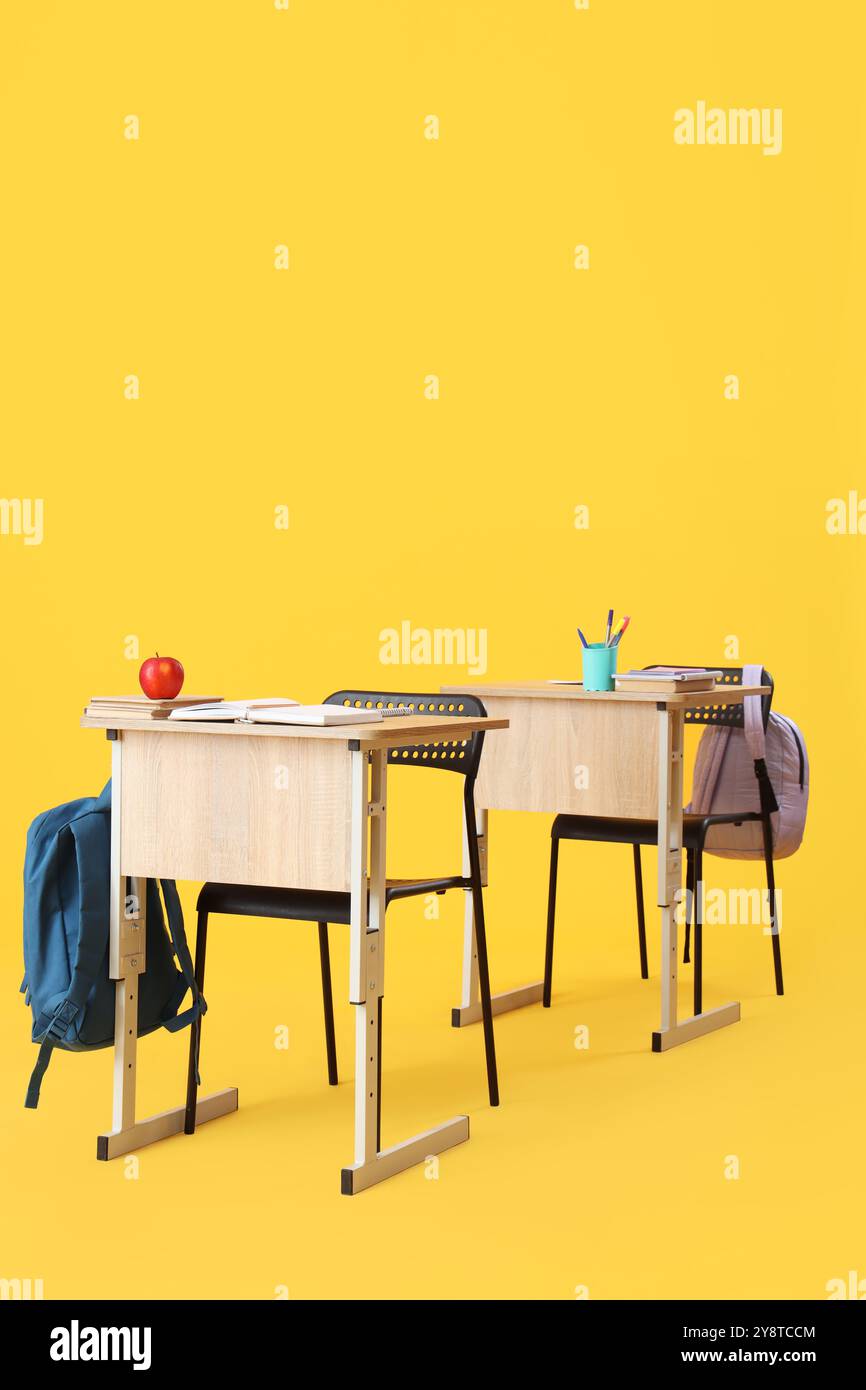 School desks stationery backpacks hi-res stock photography and images ...