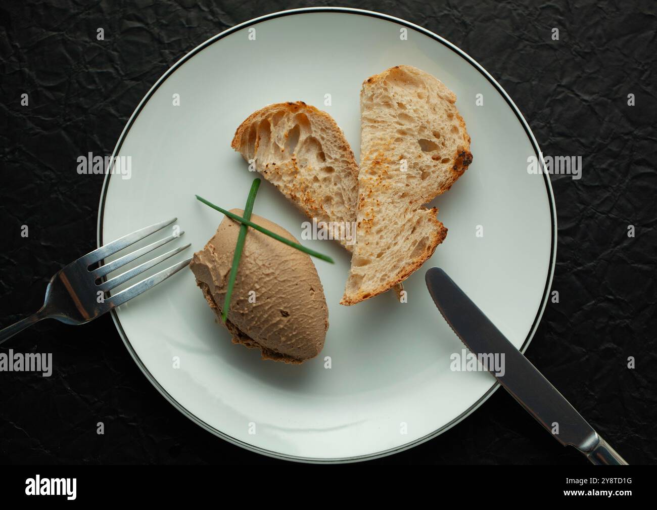 Chicken liver pate served on white plate with toasted bread Stock Photo ...