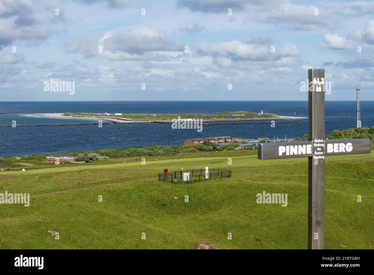 Summit cross (61, 3m height), hilly upper land of the offshore island ...