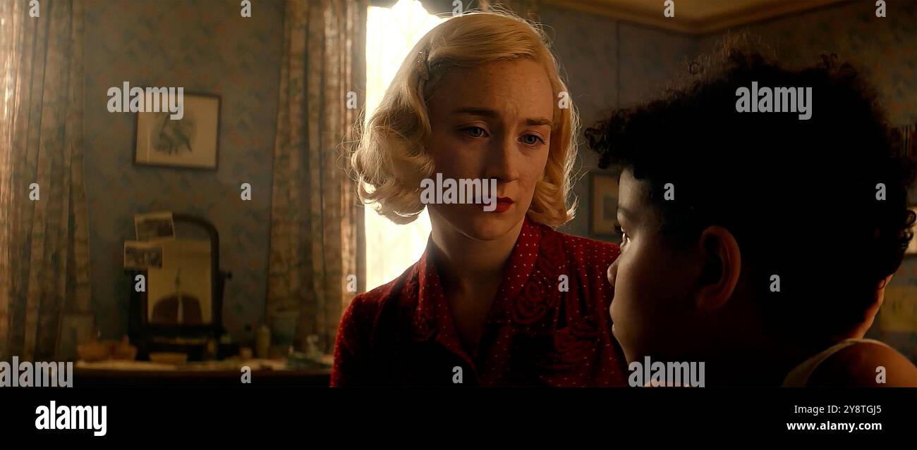 BLITZ - FILM STILLS. 2024. London, UK. Saoirse Ronan and Elliott ...