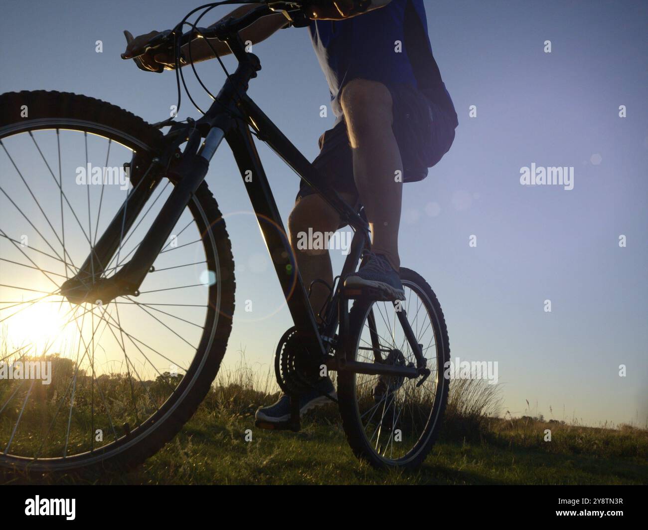 Bike in sunset light cyclist hi-res stock photography and images - Alamy