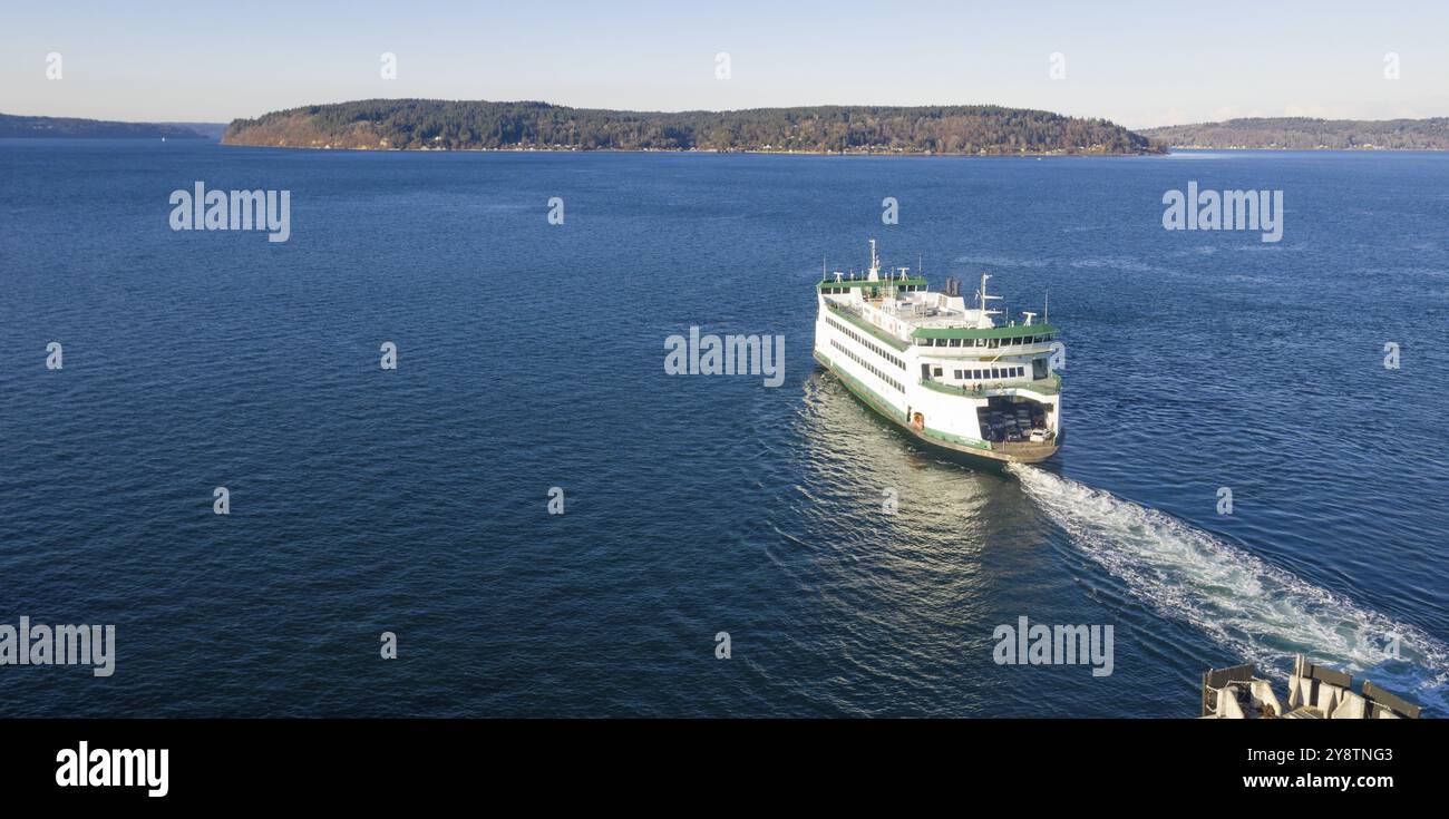 A Ferry Boat motors on into the Puget Sound heading for Vashon Island ...