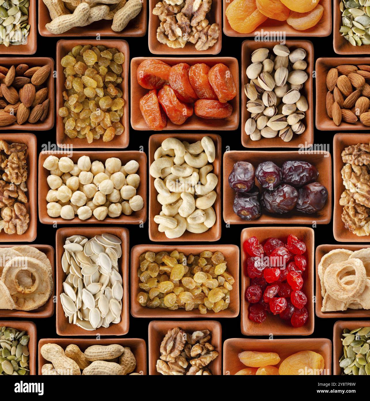 Seamless flat lay food background of dehydrated fruits, seeds and nuts ...