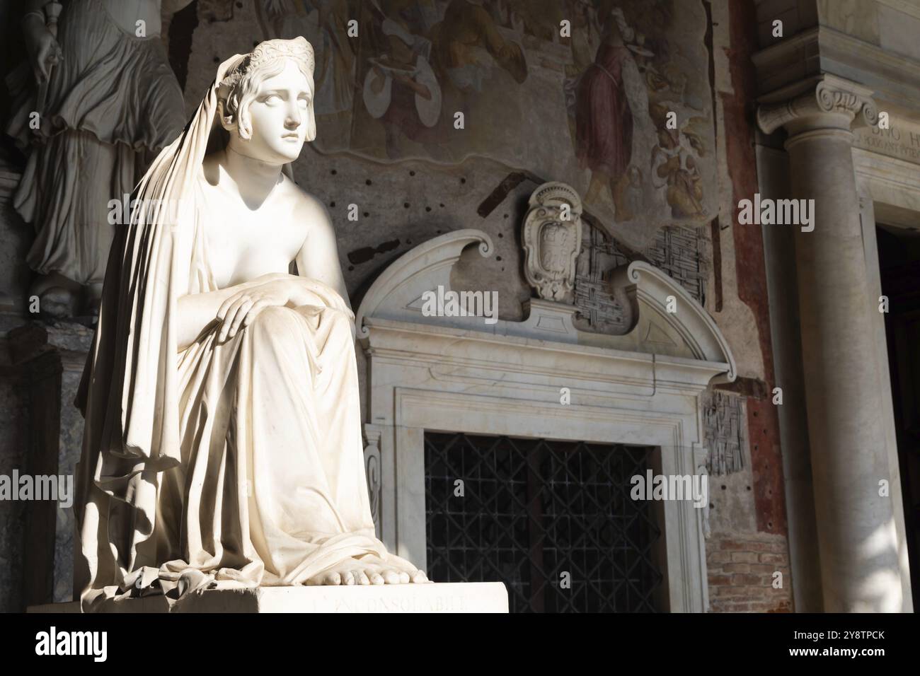 Pisa, Italy, June 2023: catholic cemetery, antique statue of sad woman ...
