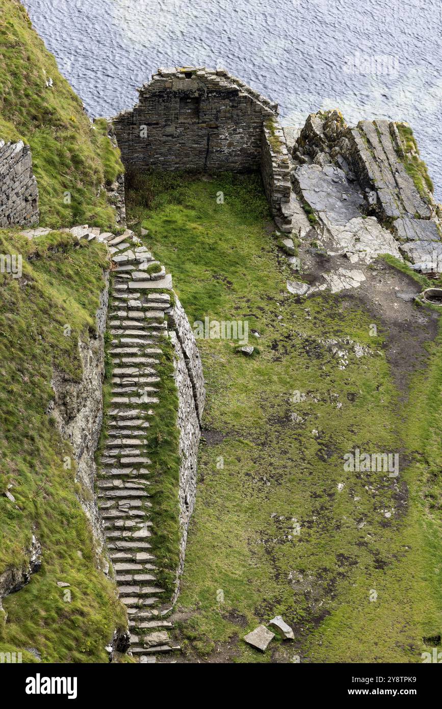Whaligoe Steps, steep steps in the rock, lead to a historic harbour on ...
