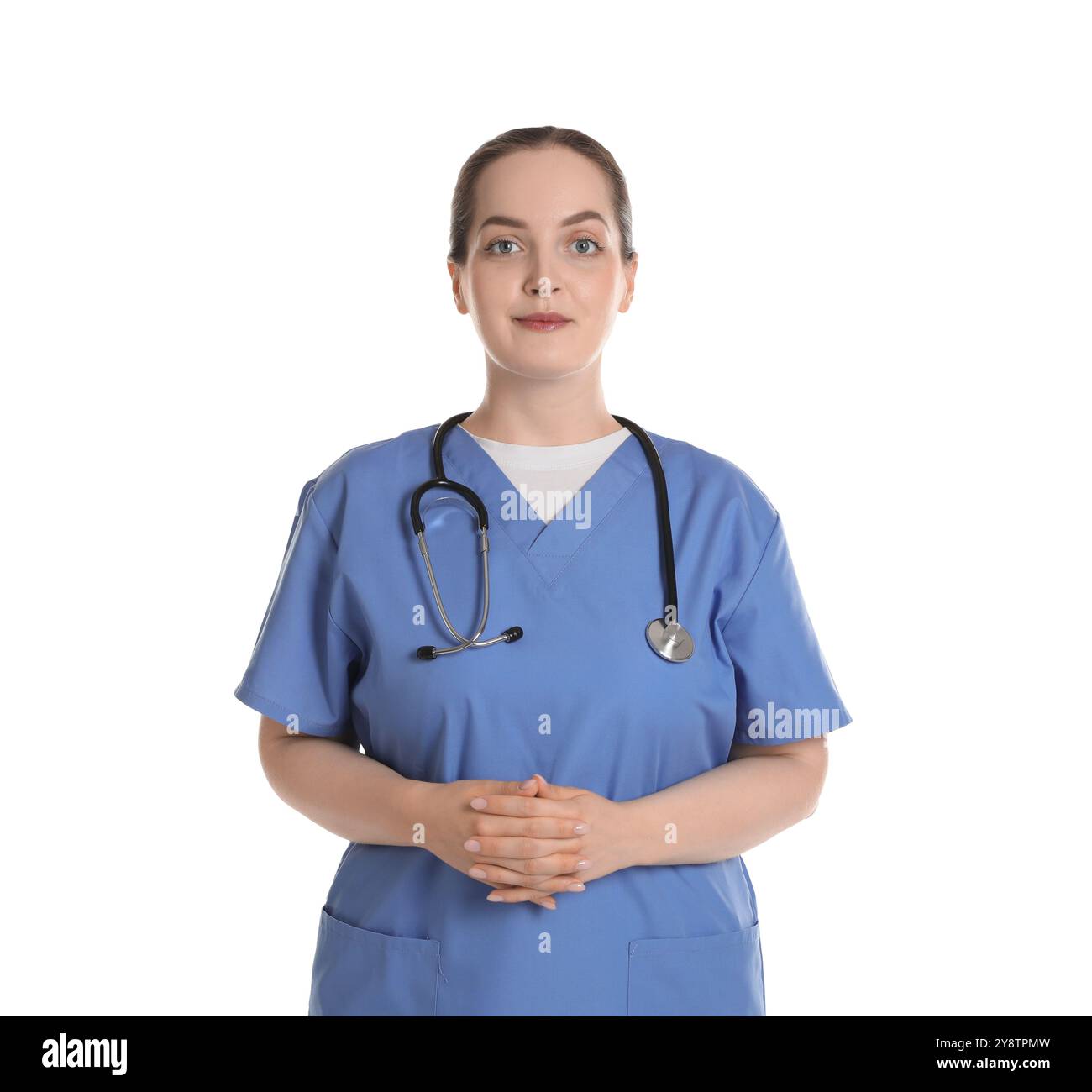 Portrait of professional nurse with stethoscope on white background ...