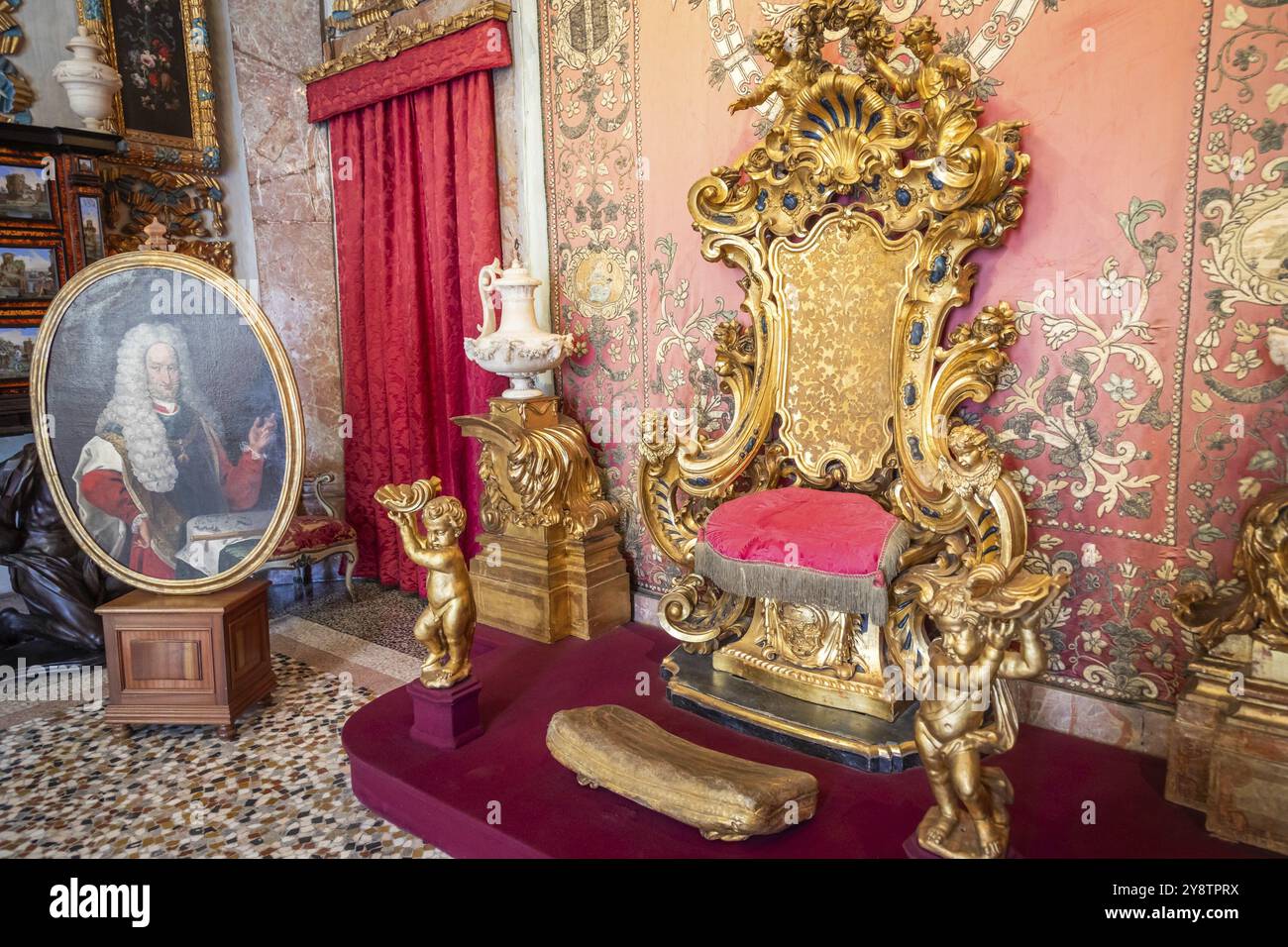 Isola Bella, Italy, 1 August 2023: antique throne in gold and red ...