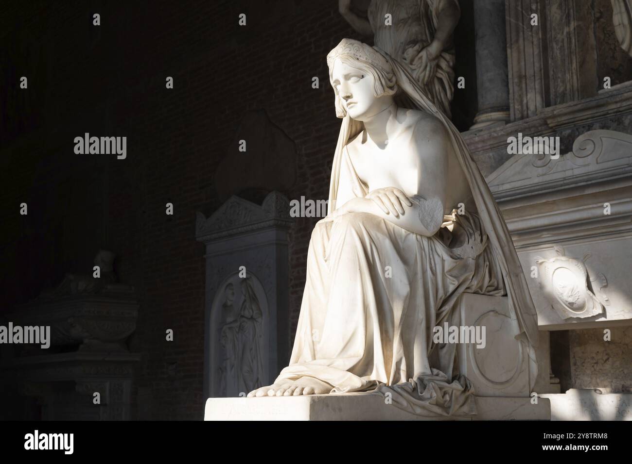 Pisa, Italy, June 2023: catholic cemetery, antique statue of sad woman ...