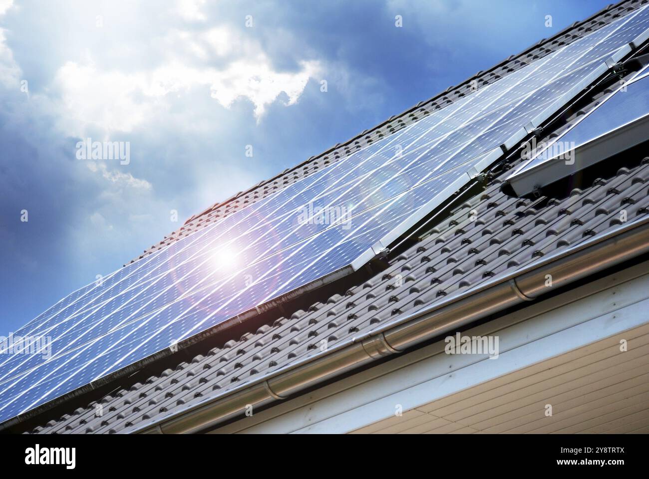 Roof with solar photovoltaic panel fragment Stock Photo - Alamy