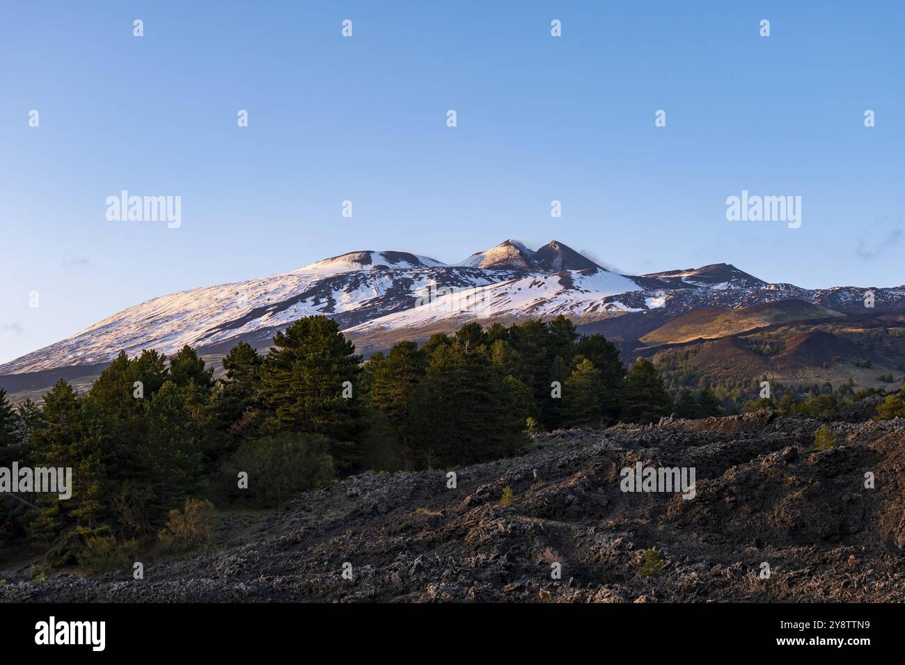 Cold lava flow on mount Etna volcano at sunset Stock Photo - Alamy