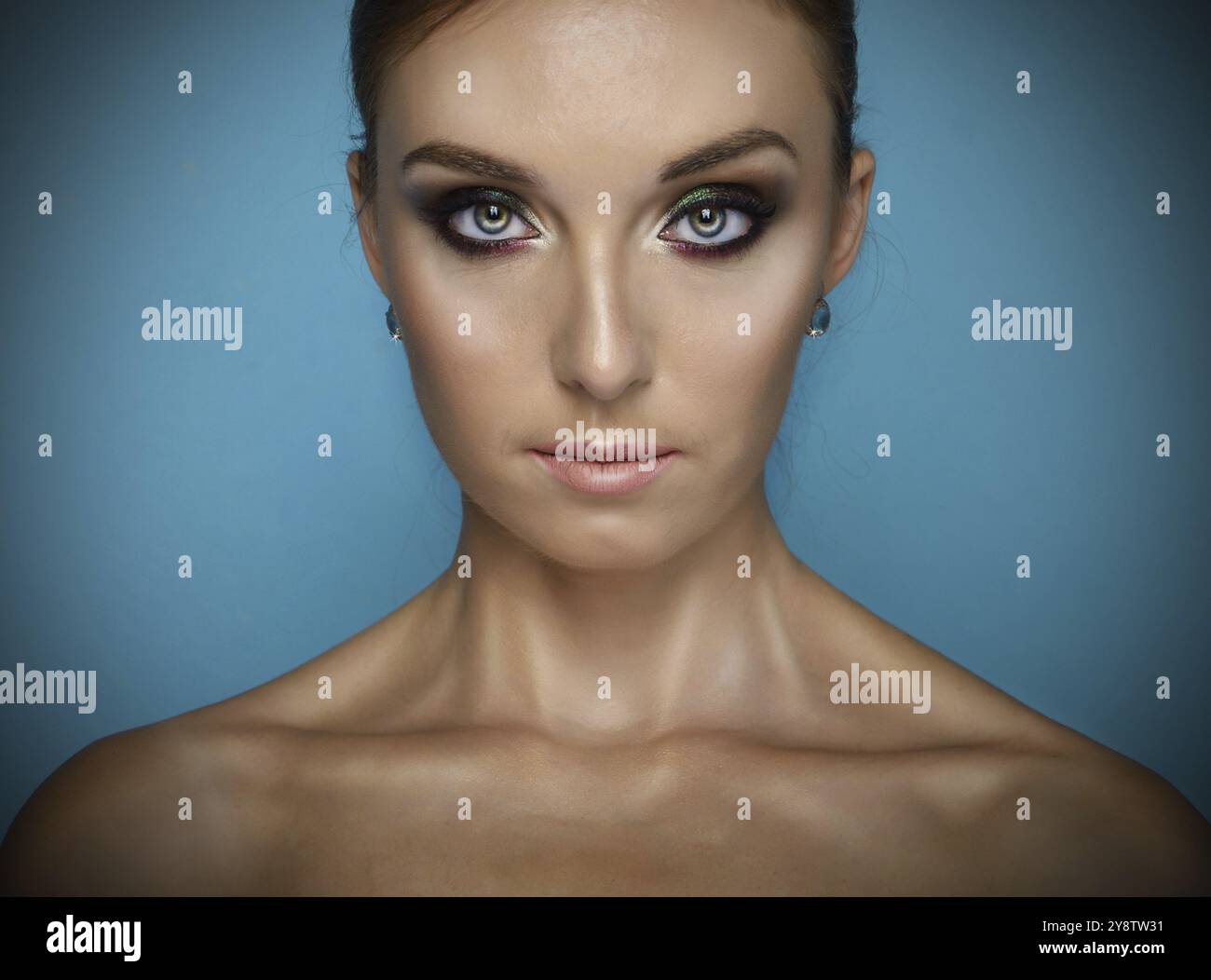 Young woman portrait looking straight ahead Stock Photo - Alamy