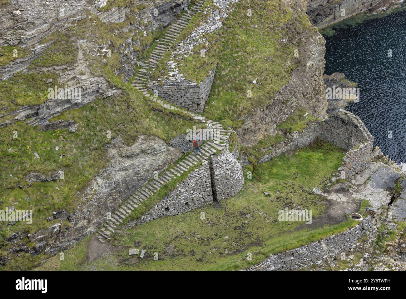 Whaligoe Steps, steep steps in the rock, lead to a historic harbour on ...