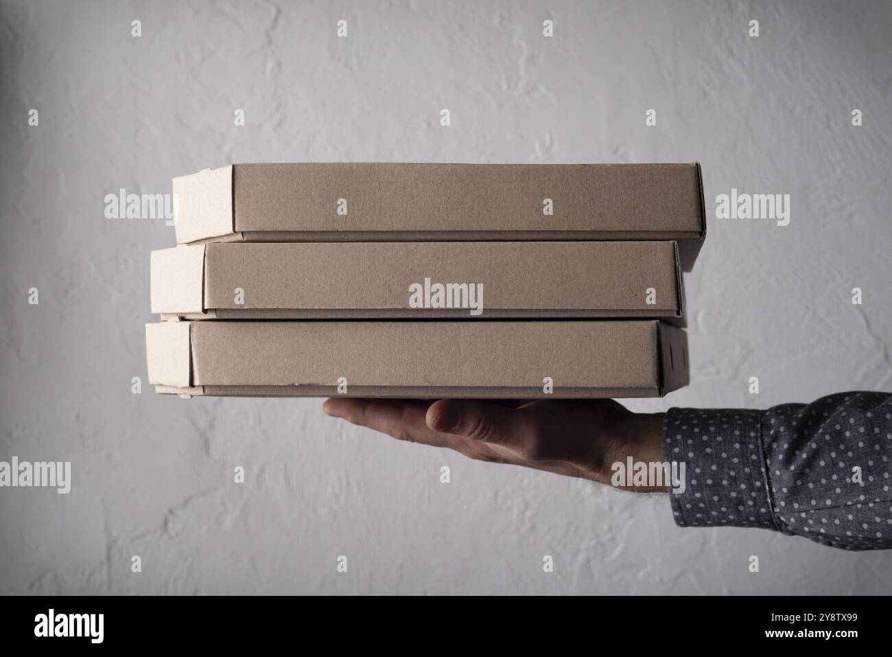 Side view mans hands hold hi-res stock photography and images - Alamy