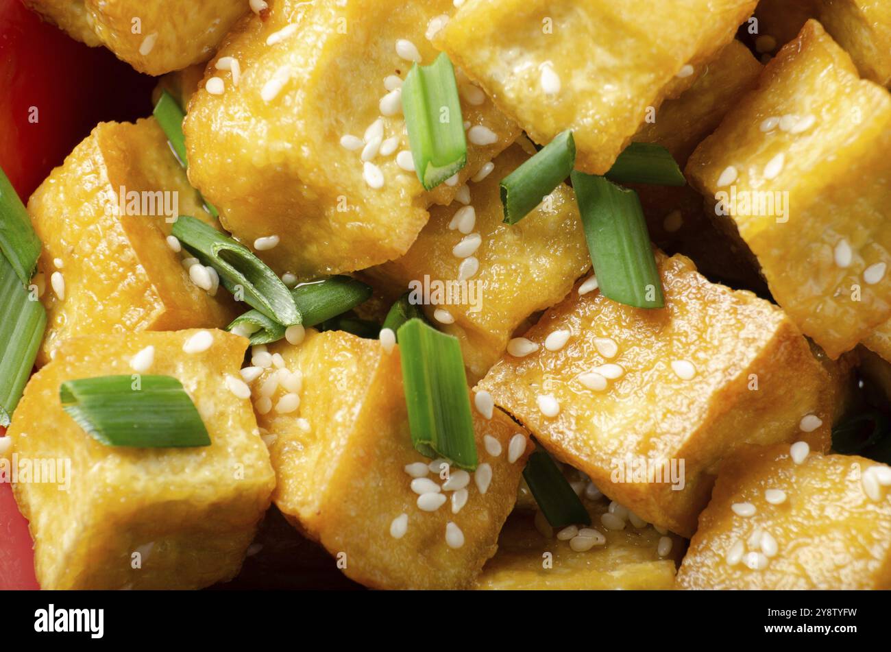 Flat lay background of Close Up view at crispy fried tofu pieces with ...