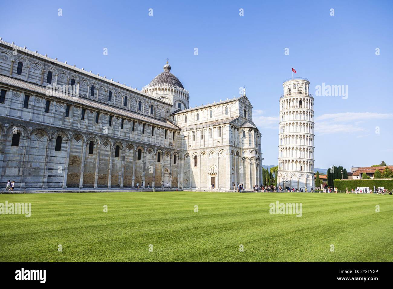 Pisa, Italy, 29 June 2023: Famous Leaning Tower landmark with blue sky ...