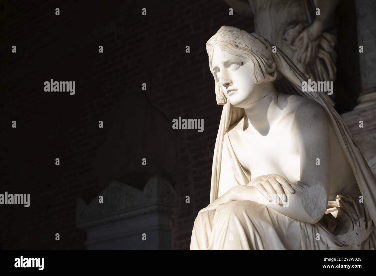 Pisa, Italy, June 2023: catholic cemetery, antique statue of sad woman ...