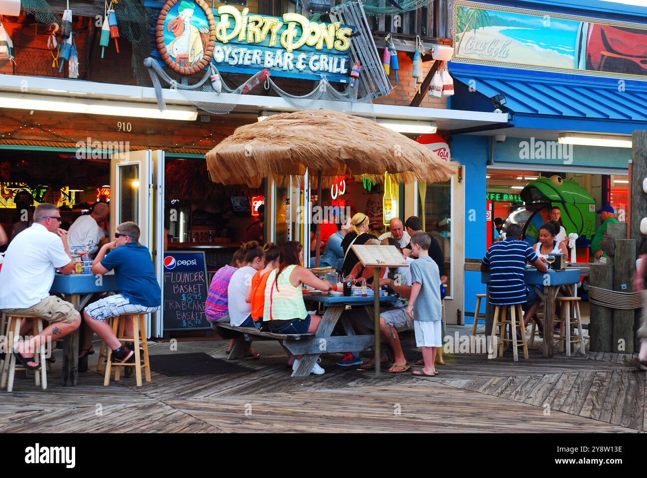 Family on beach and cafe hi-res stock photography and images - Alamy