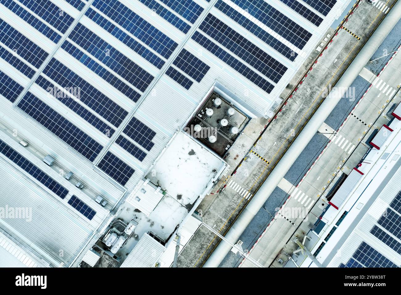 Solar energy for factory and warehouse building. Solar panels on roof ...