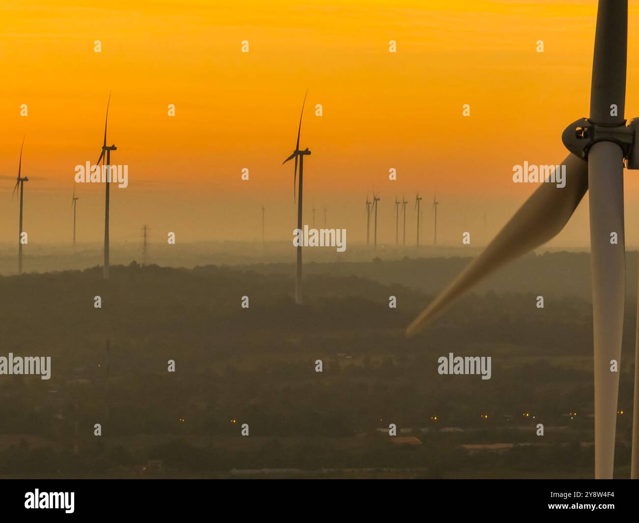 Wind farm field and sunset sky. Wind power. Sustainable, renewable ...