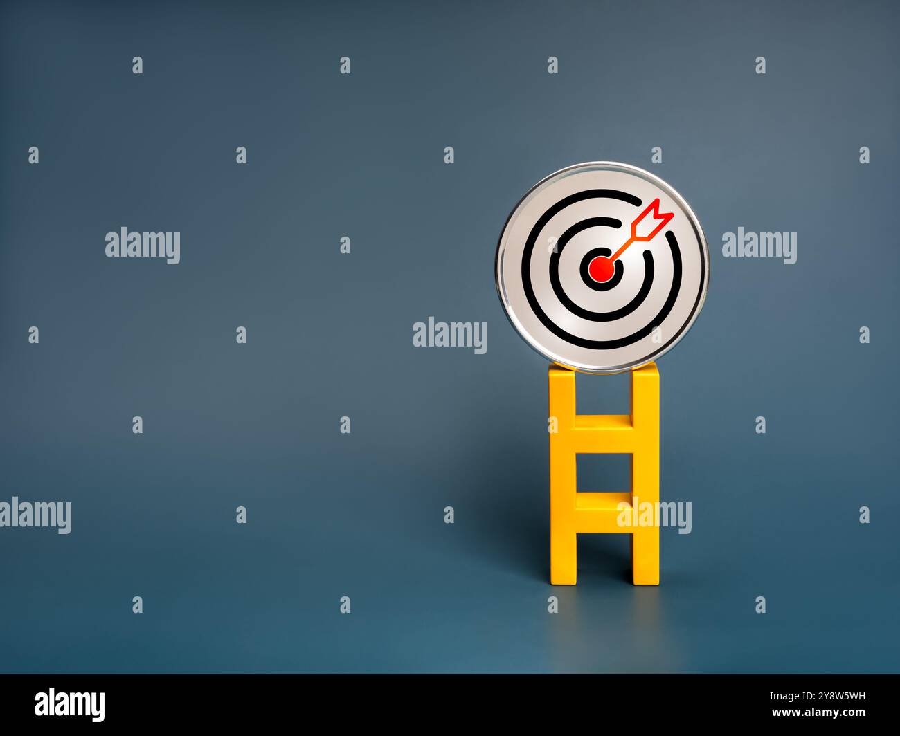 3d Target icon on round chrome badge on top of yellow isolated on blue ...