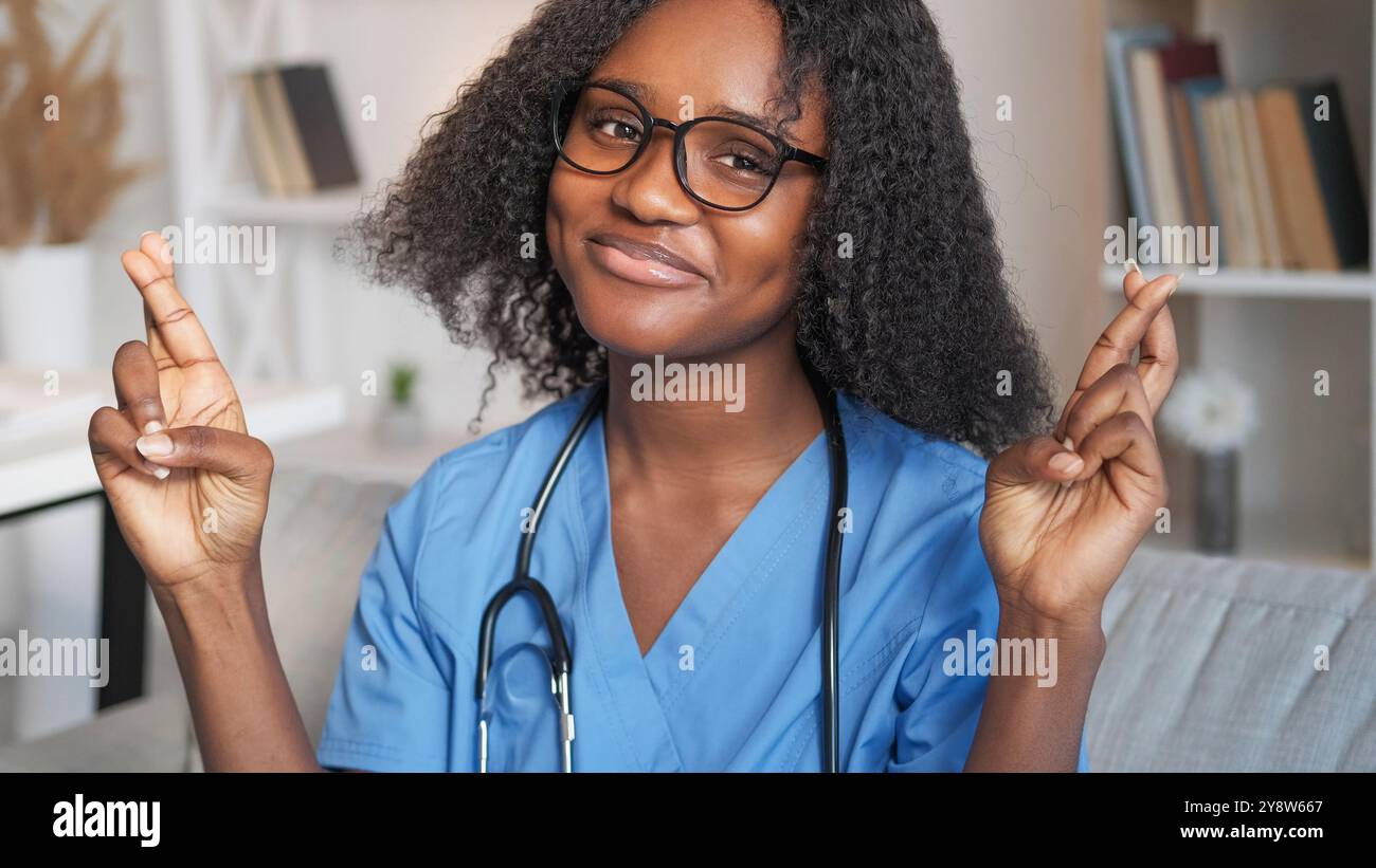 Doctor luck. Hopeful gesture. Superstitious medical specialist nurse ...