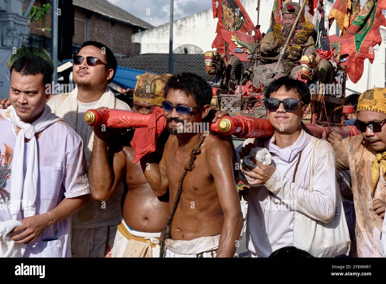 In a procession during the Vegetarian Festiival in Phuket Town ...