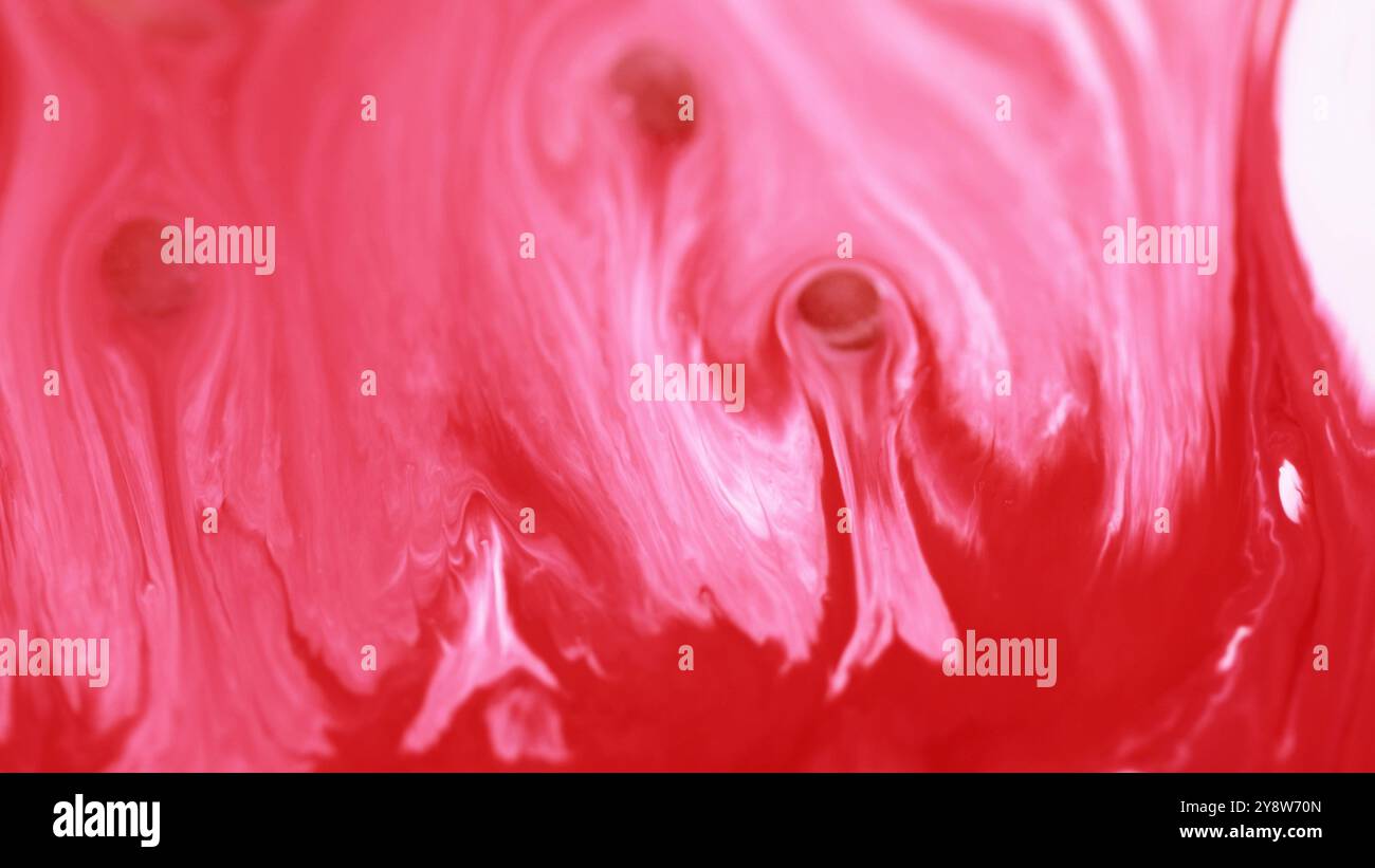 Acrylic paint spill. Ink drip. Defocused red pink white color bubble ...