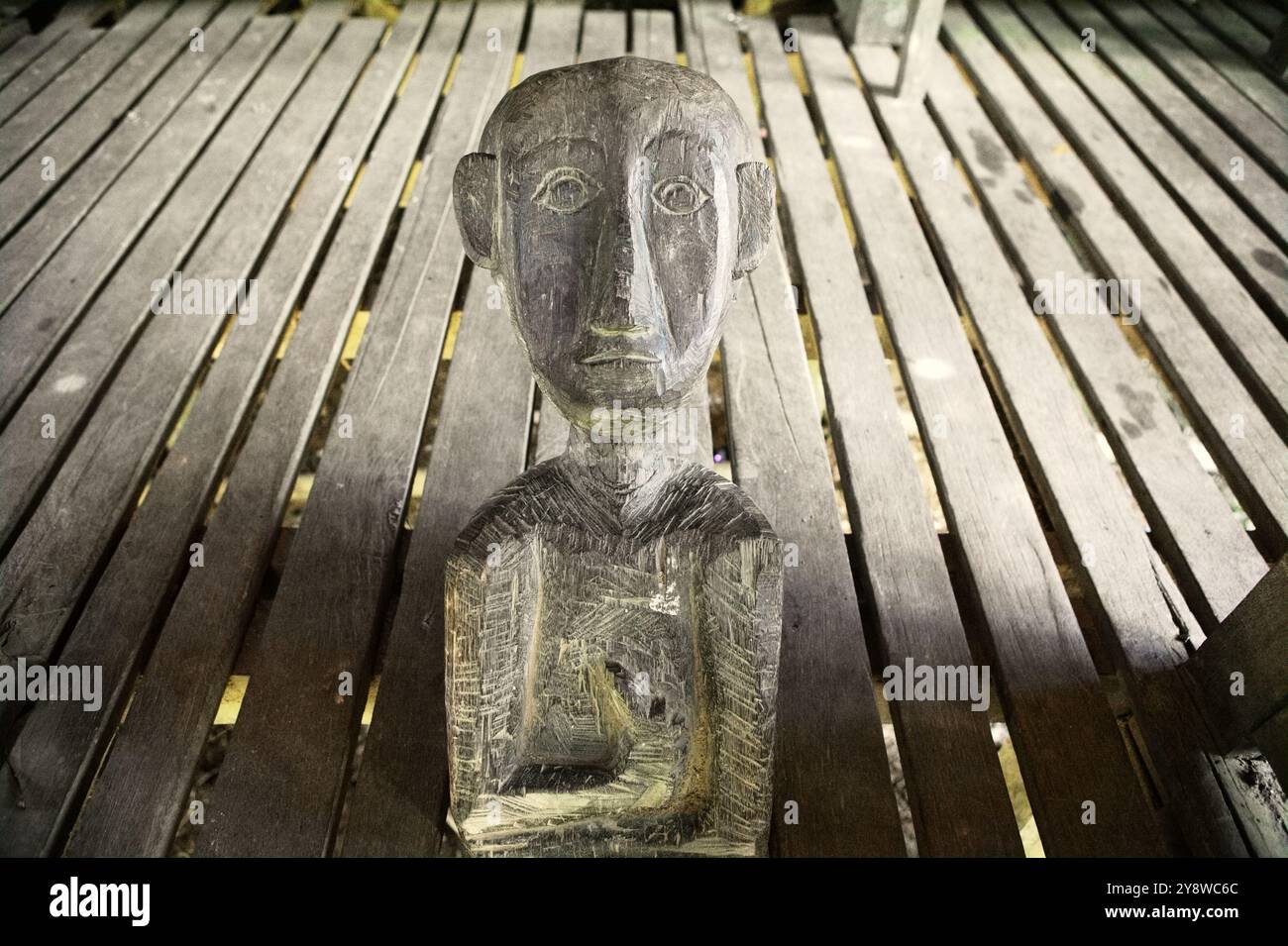 Human-shaped sculpture at Bali Gundi longhouse of traditional Dayak ...