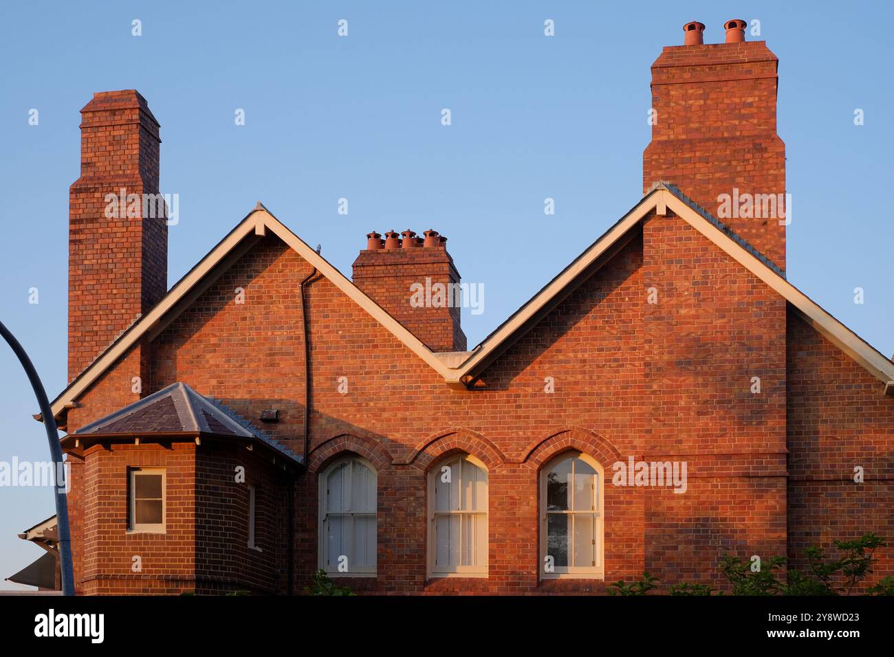 Upper story and chimneys of a two story late Victorian, Federation ...