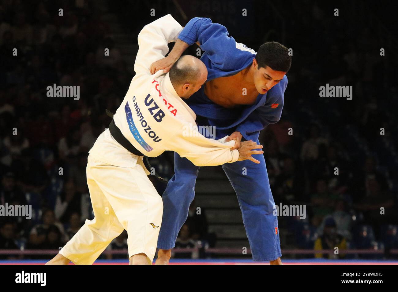 Sherzod NAMOZOV of Uzbekistan (white) who won gold vs Zurab ZURABIANI ...