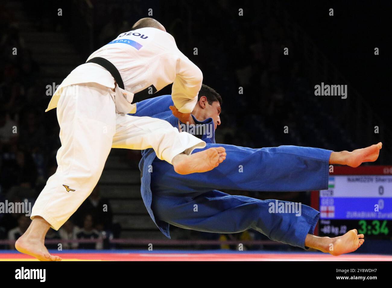 Sherzod NAMOZOV of Uzbekistan (white) who won gold vs Zurab ZURABIANI ...