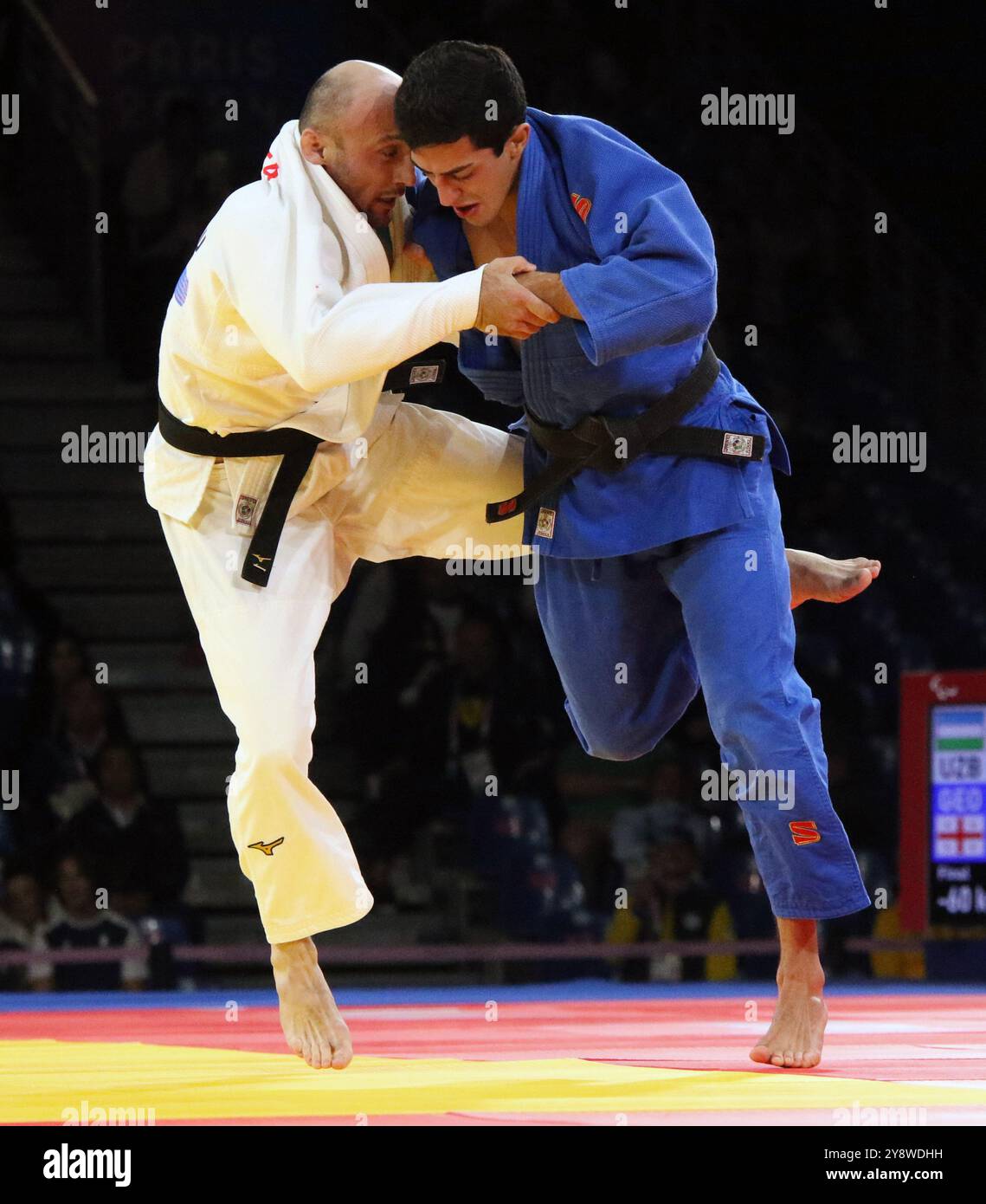 Sherzod NAMOZOV of Uzbekistan (white) who won gold vs Zurab ZURABIANI ...