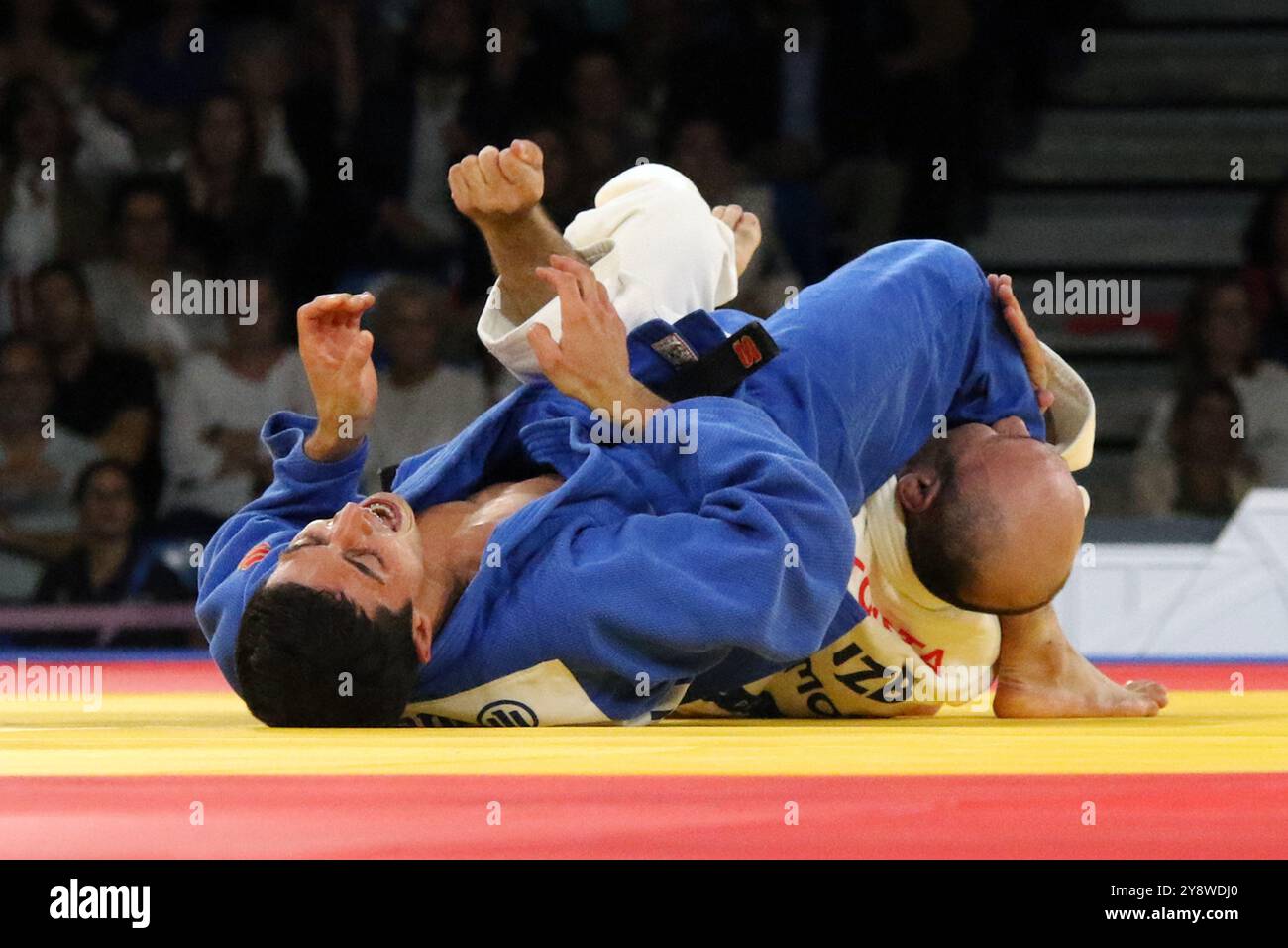 Sherzod NAMOZOV of Uzbekistan (white) who won gold vs Zurab ZURABIANI ...