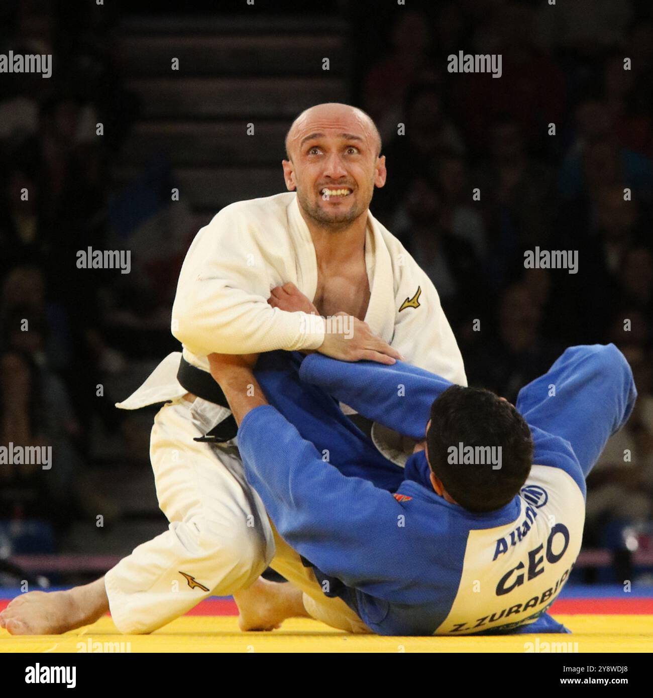 Sherzod NAMOZOV of Uzbekistan (white) who won gold vs Zurab ZURABIANI ...
