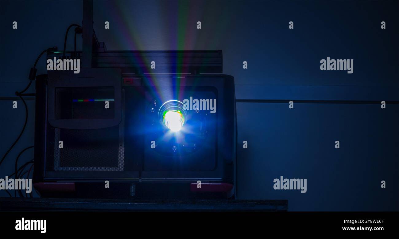 modern laser cinema projector in the cinema during a movie session in ...