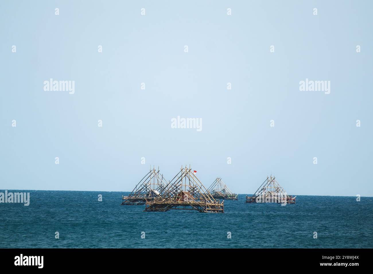 Traditional Bagan Structure Drifting in Serene Ocean Waters. Blue Ocean ...