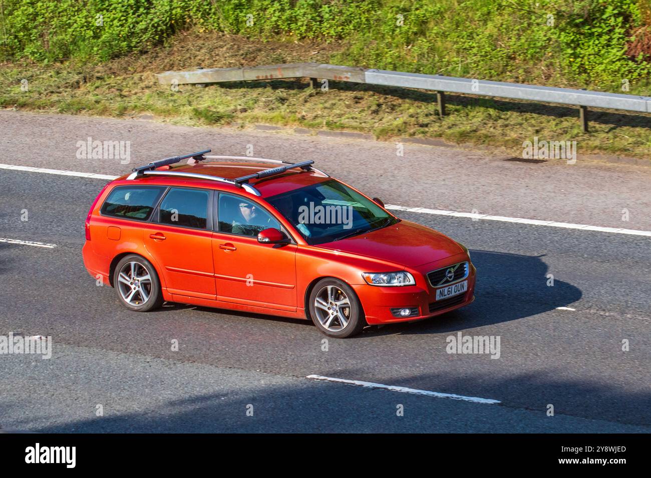 2011 Orange Volvo V50 SE LUX Edition Drive estate car motoring on the ...