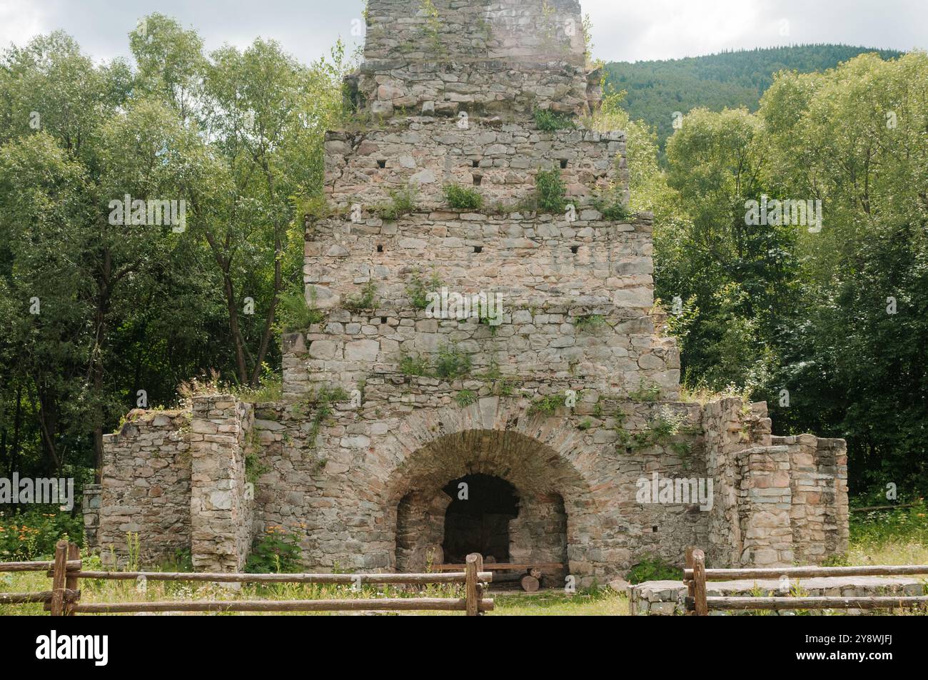 Ancient Stone Ruins Surrounded by Lush Greenery and Mountains Stock ...
